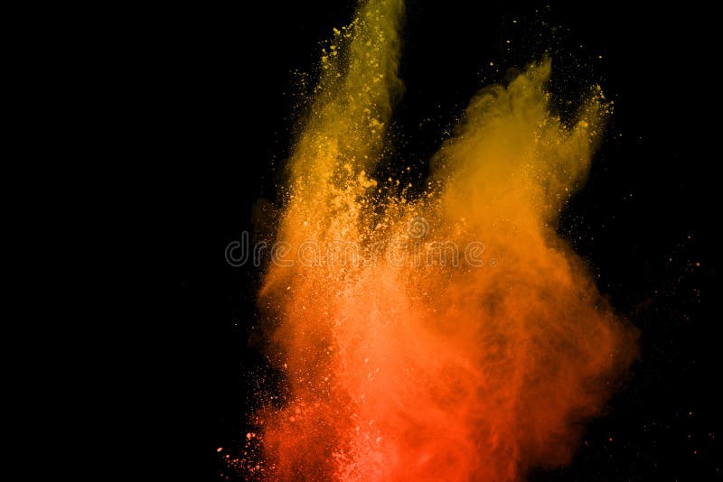 Orange Powder Explosion Isolated on Black Background.Colored Dust ...