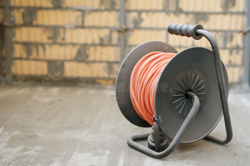 Orange Power Extension Cable Reel at the Construction Site Stock Image ...