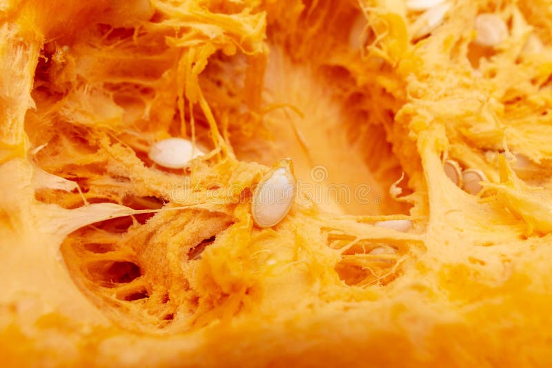 Orange Pulp with Seeds in a Pumpkin As Background Stock Image - Image ...