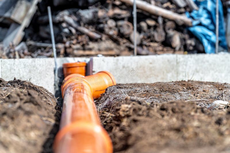 Orange PVC Plastic Pipes on the Construction Site Stock Photo - Image ...