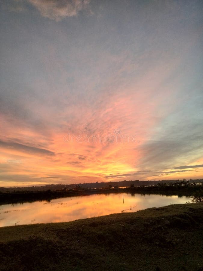 The Orange Rays of the Rising Sun are Touching the East. Stock Image ...