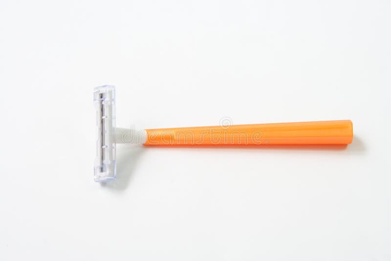 Orange Razor on White Background Stock Photo - Image of white, female ...