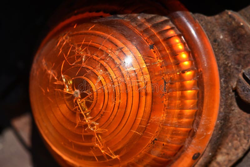 Orange Reflector in a Rusty Setting Stock Photo - Image of metal, retro ...