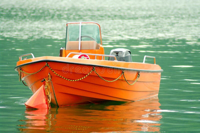 Orange Rescue Boat on the Water Stock Image - Image of rope, safe: 30832681