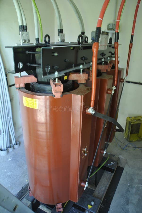 Orange resin transformer stock image. Image of core - 135068173