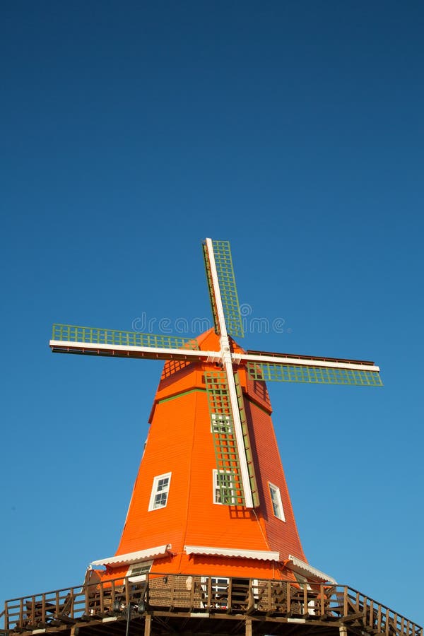 Orange retro windmill stock image. Image of nature, dutch - 26760583