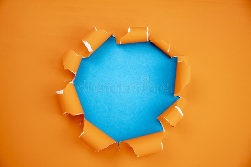 Orange Ripped Open Paper On Blue Paper Background,space For Your ...