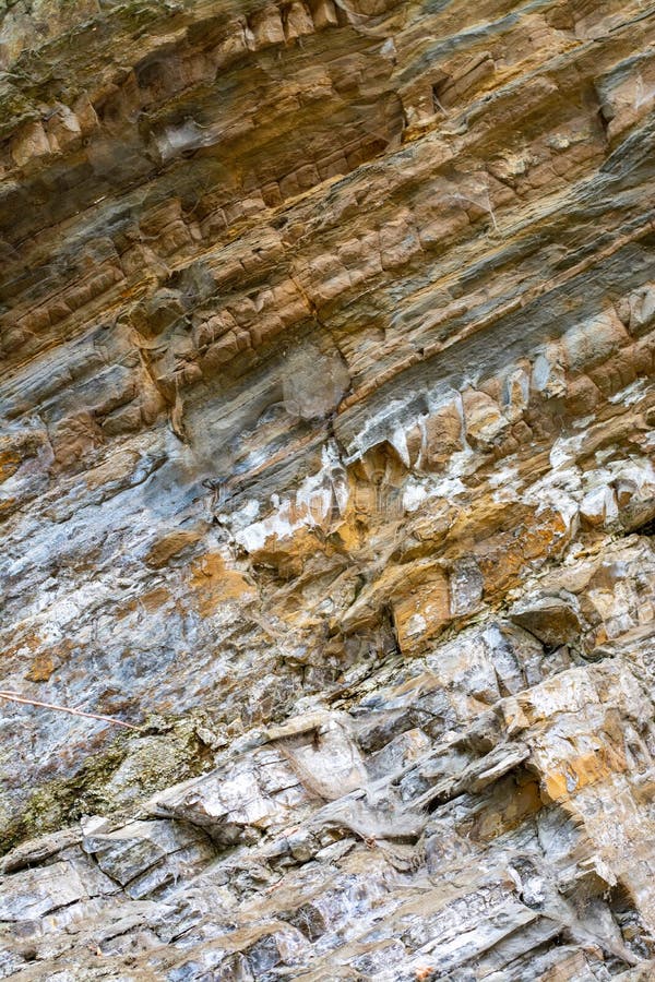 Orange Rock stock photo. Image of layers, moss, material - 179607932