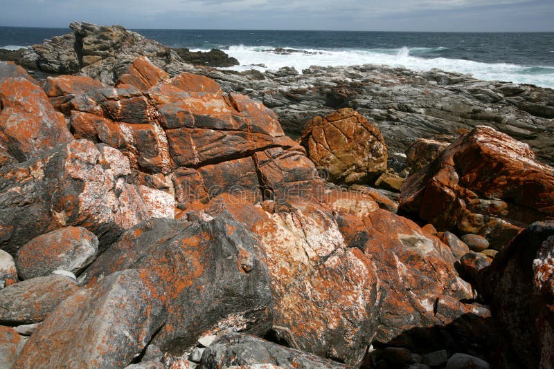 Orange rocks stock image. Image of cape, clouds, leisure - 4591003