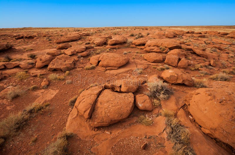 Orange rocks in the desert stock photo. Image of summer - 64975656