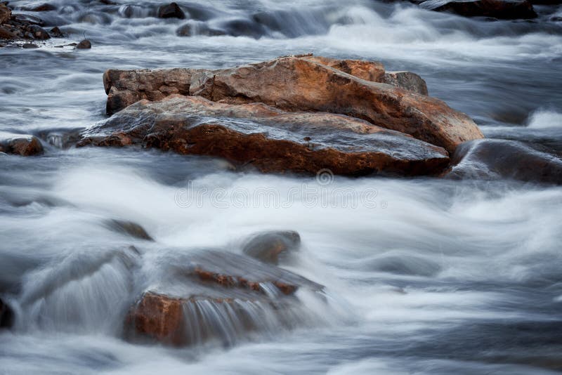 Rocks in the water stock image. Image of backgrounds - 29761369