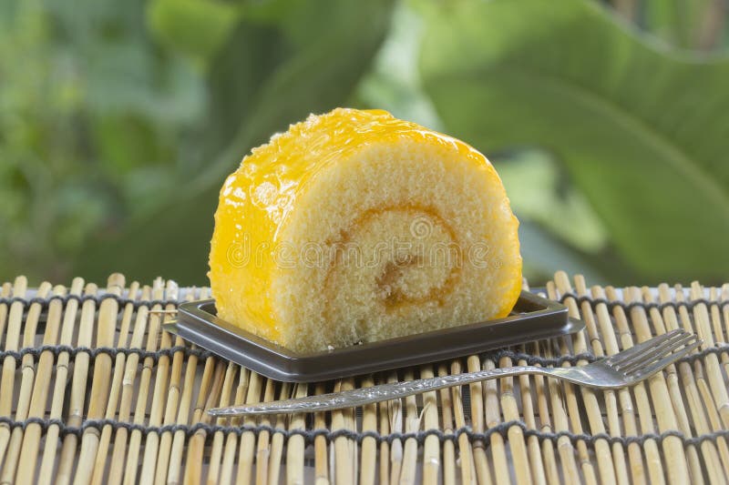 Orange roll cake stock photo. Image of roll, plastic - 67647094