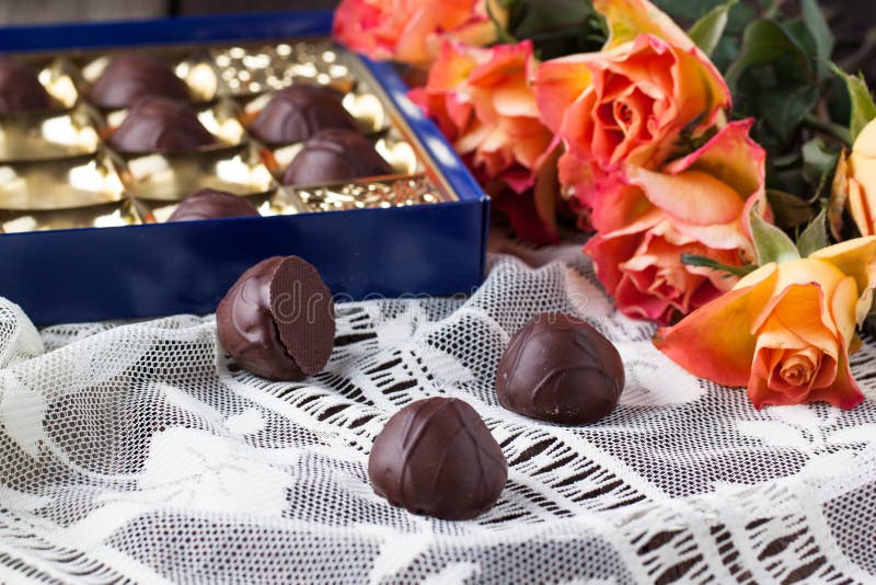 Orange Roses with Chocolate Stock Photo - Image of rose, life: 28805912