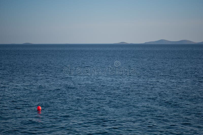 Round red buoy on the sea stock image. Image of harbour - 185596683