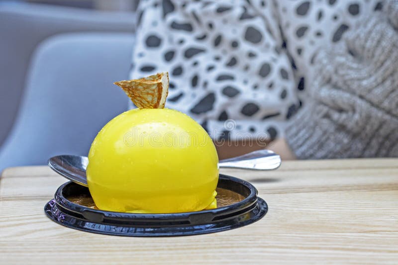 Orange Round Cake with a Piece of Dry Orange on the Table. Stock Image ...