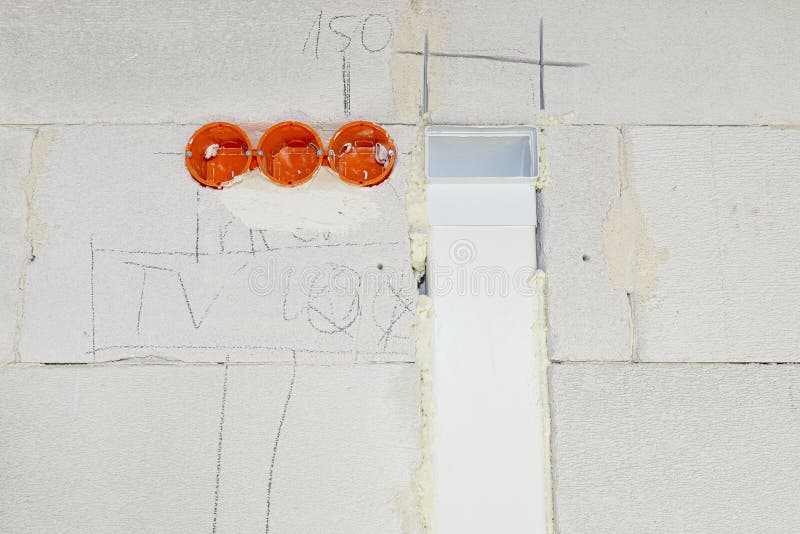 Orange, Round Junction Box Mounted in the White Wall with Protruding ...