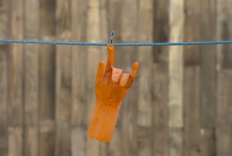 The Orange Rubber Gloves are Hanging on the Plastic String Stock Photo ...