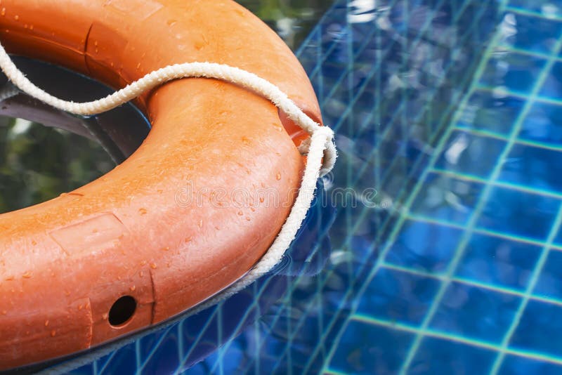 Orange Rubber Ring for Life in the Pool. Stock Photo - Image of ...