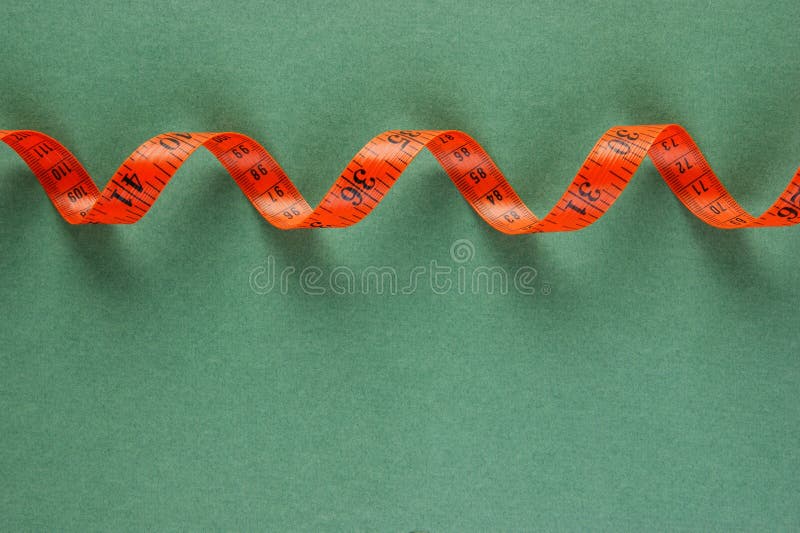 Orange sartorial meter stock photo. Image of green, close - 67642610