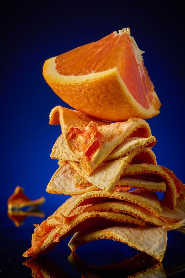 Orange Section Atop a Stack of Dried Peels Stock Photo - Image of peel ...