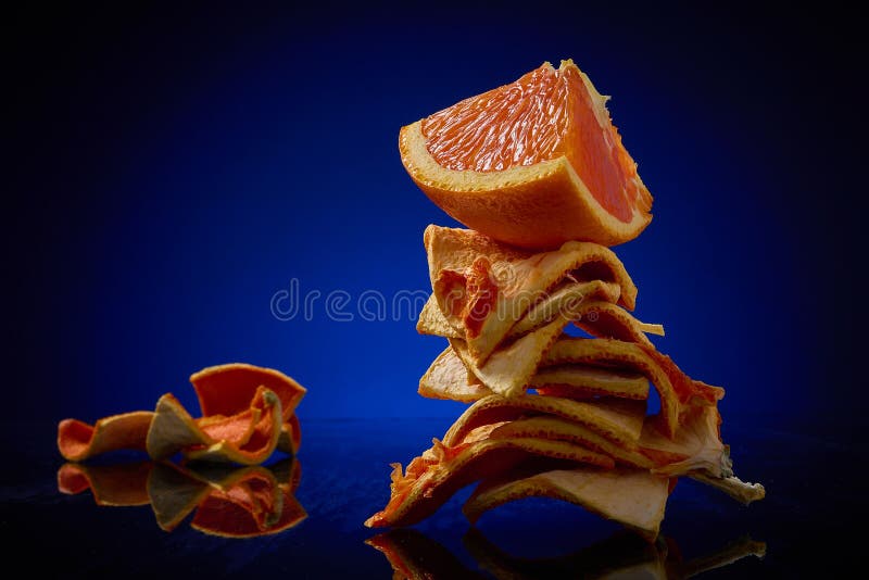 Orange Section Atop a Stack of Dried Peels Stock Image - Image of ...