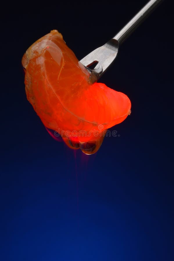 Orange Section Dripping with Syrupy Glaze Stock Image - Image of grand ...
