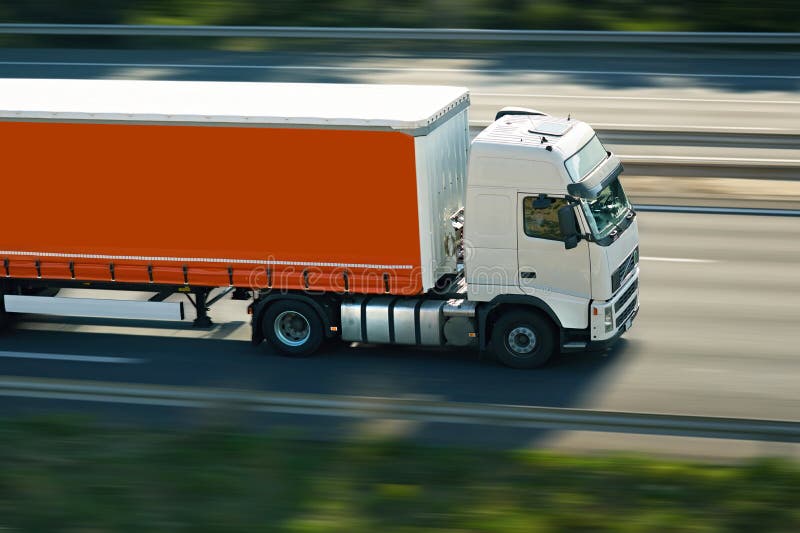 Orange semi truck stock image. Image of trailer, highway - 54664853