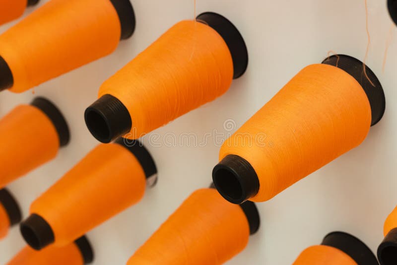 Orange Sewing Thread Spools Stock Image - Image of repair, traditional ...