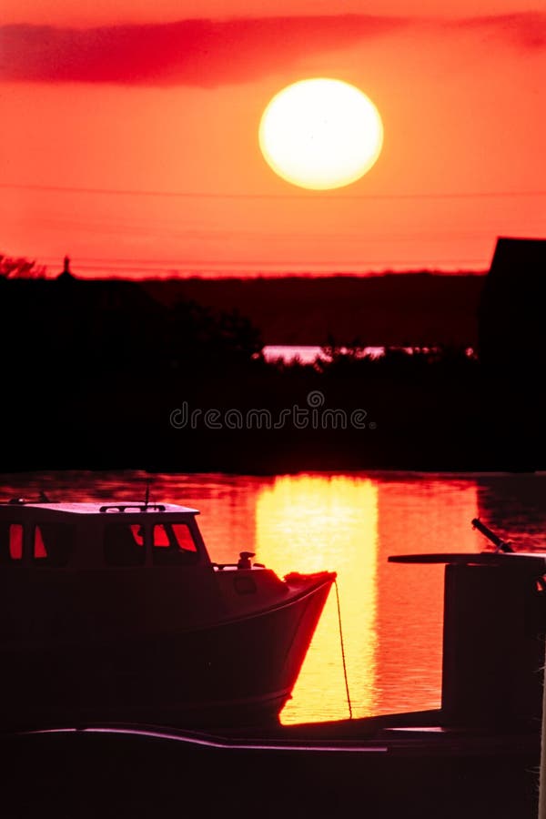 Orange Sky and Boat the Harbor Stock Photo - Image of orange, lighting ...