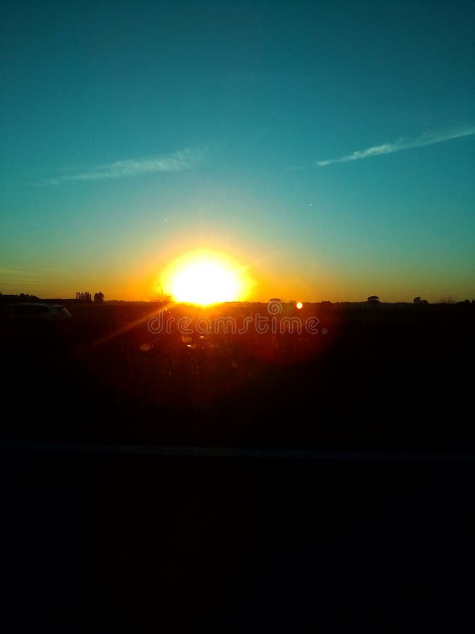 Orange sky at night stock photo. Image of horizon, orange - 194215406