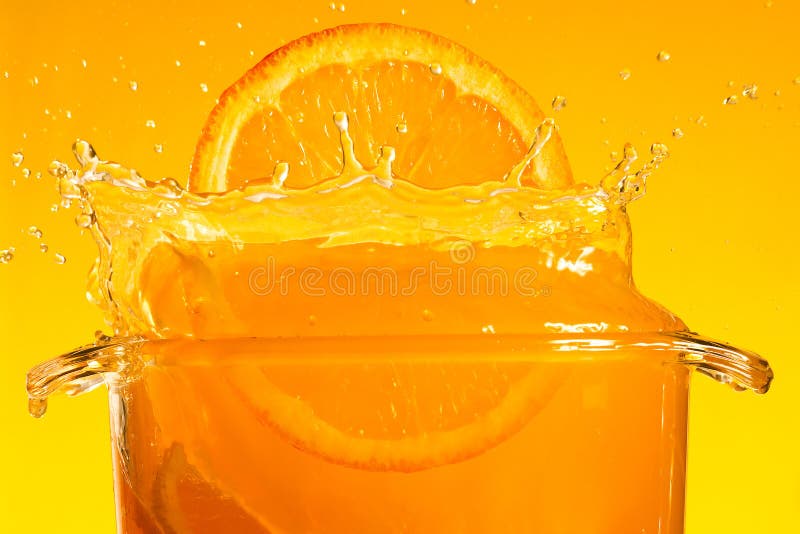 Orange Slice Falling into the Liquid Stock Photo - Image of beauty ...