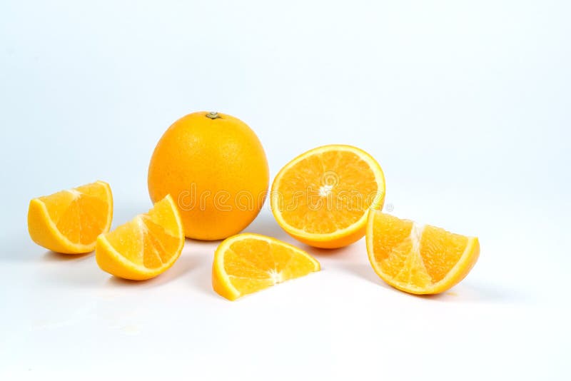 An Orange with Sliced Oranges White Background Stock Photo - Image of ...