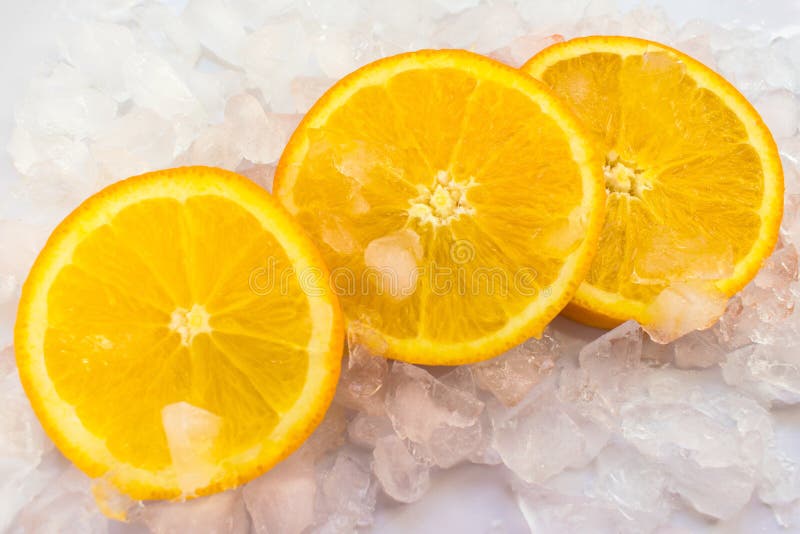 Orange Slices are in the Ice Stock Image - Image of dessert, natural ...