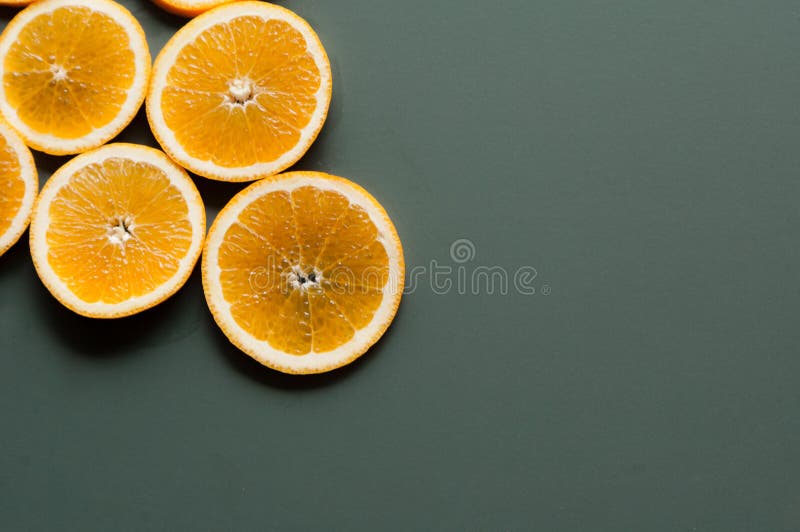 Orange Slices on One Side on Green Background Stock Image - Image of ...