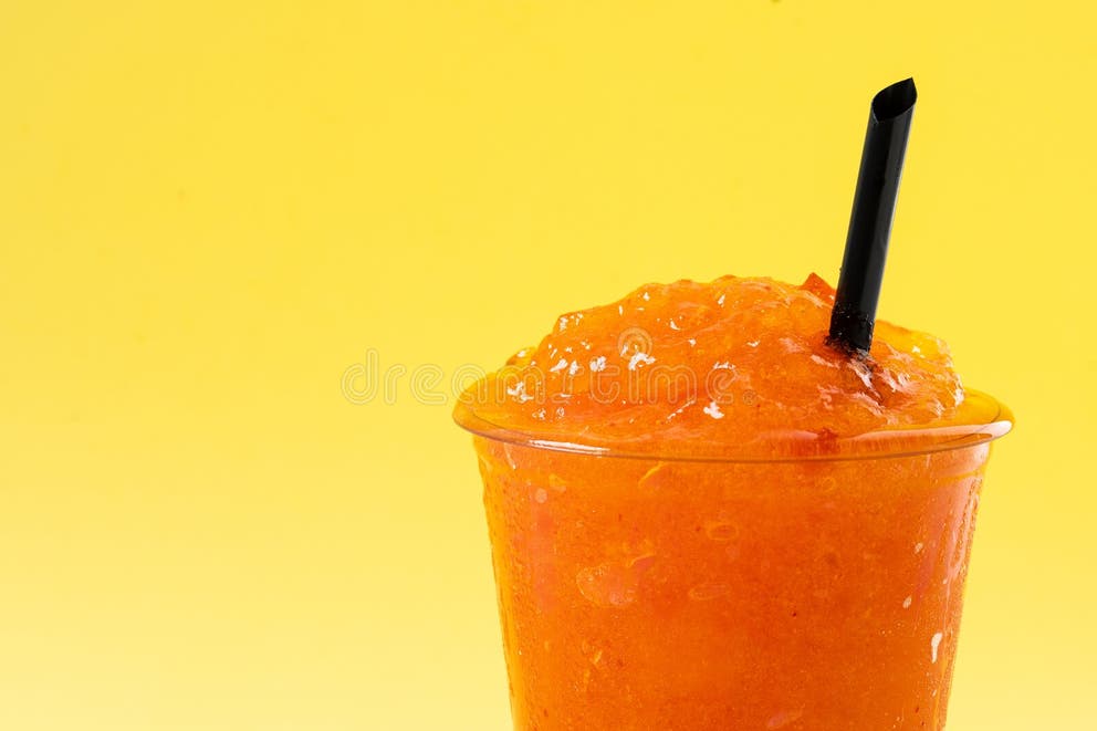 Orange Slushie on Yellow Background Stock Image - Image of isolated ...