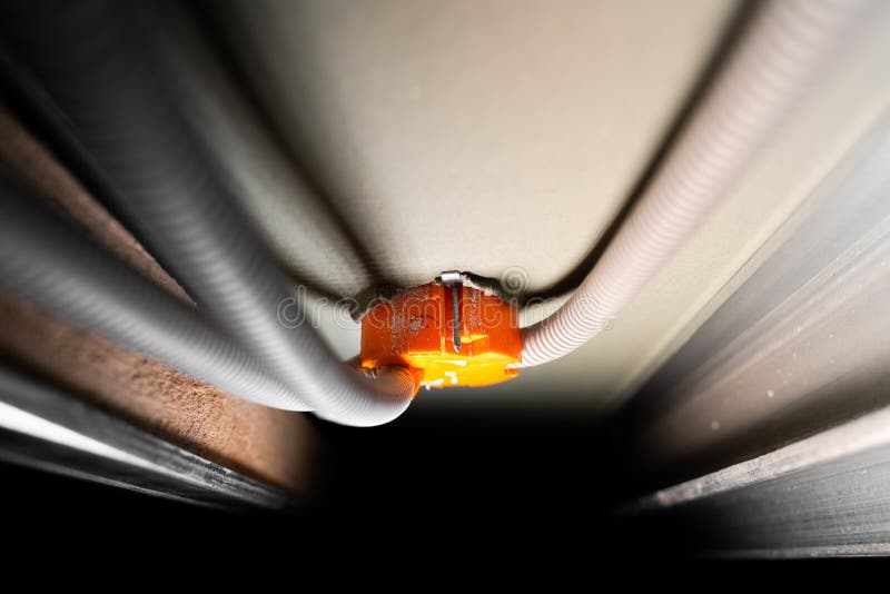 Orange Socket Box in Drywall with Wires in a Protective Corrugated Pipe ...