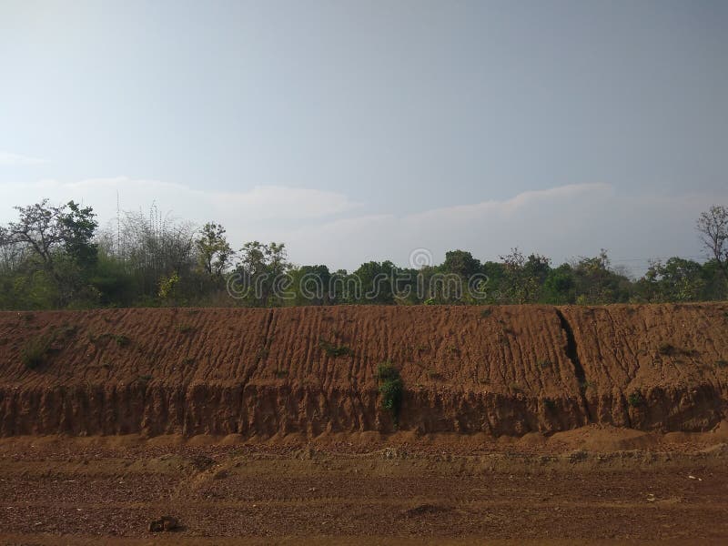 Orange soil rain cutted stock image. Image of forest - 118239311