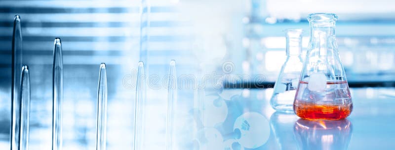 Orange Solution in Science Glass Flask in Blue Chemistry School Lab ...