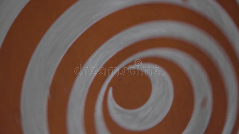 Orange Spinning Hypnotic Wheel Close Up. Hypnosis Spirals Stock Footage ...