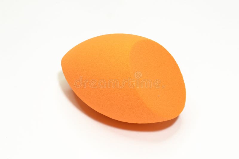 Orange sponge for make-up stock photo. Image of cosmetic - 259602578