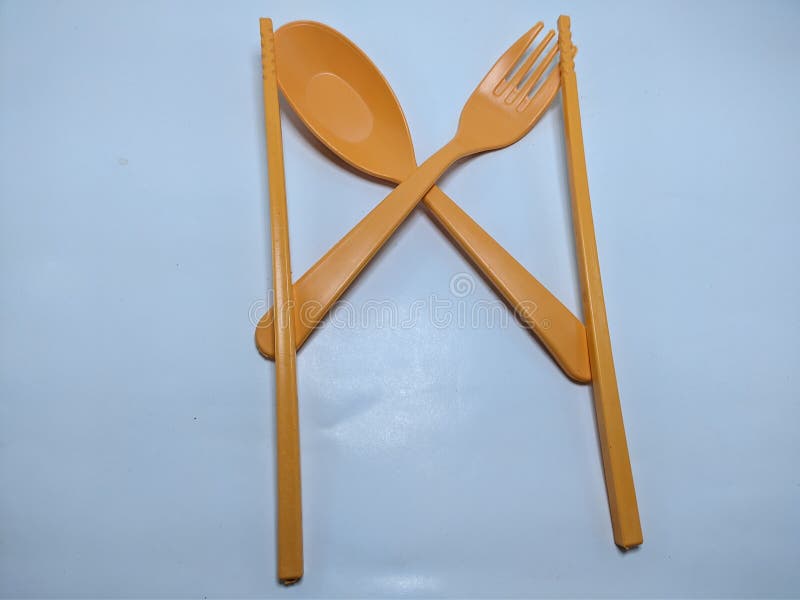 Orange Spoon, Fork and Slanted Stock Photo - Image of circle, room ...