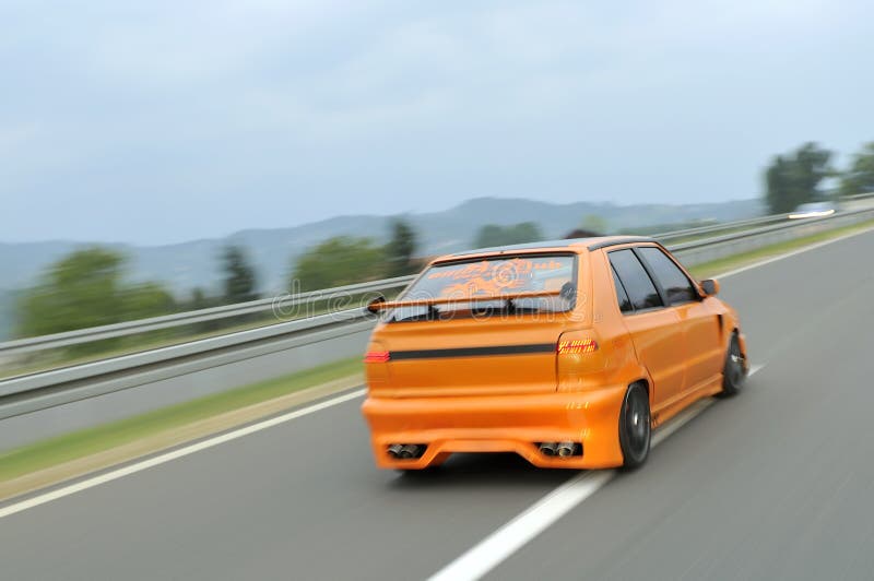 Orange Sport Car Drive Fast Stock Image - Image of acceleration ...