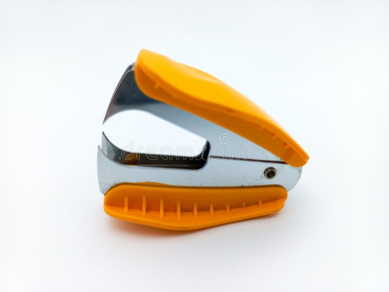 Orange Staple Remover Isolated on White Background. View from Above on ...