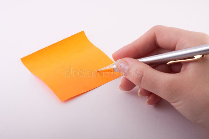 Orange sticker stock image. Image of metal, sticker, hand - 12742139