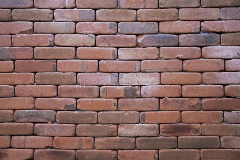 Orange stone brick wall stock image. Image of concrete - 93356211