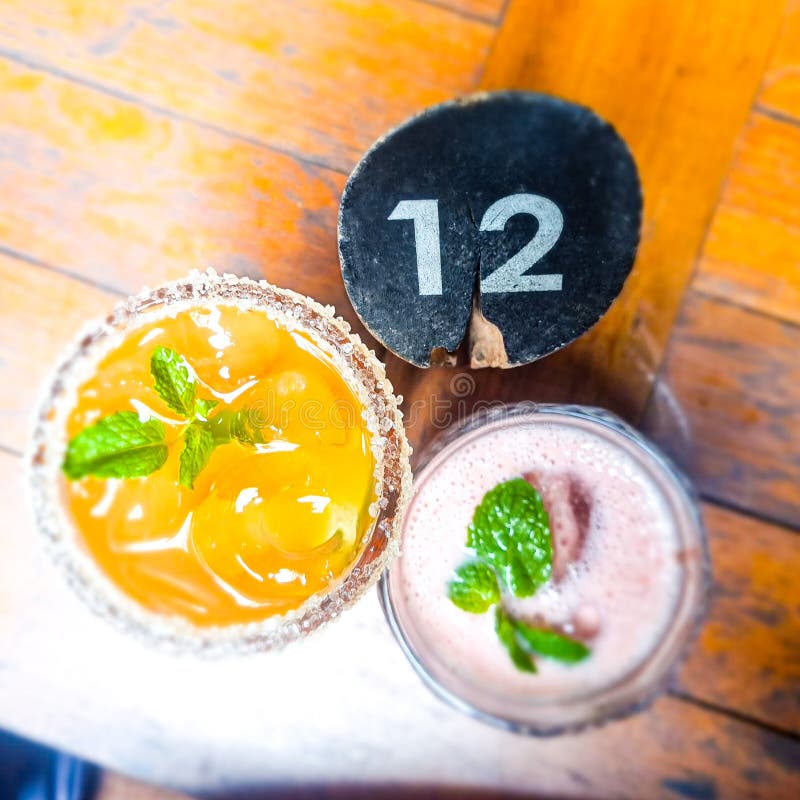 Orange and Strawberry Juice with Number 12 Stock Photo - Image of juice ...