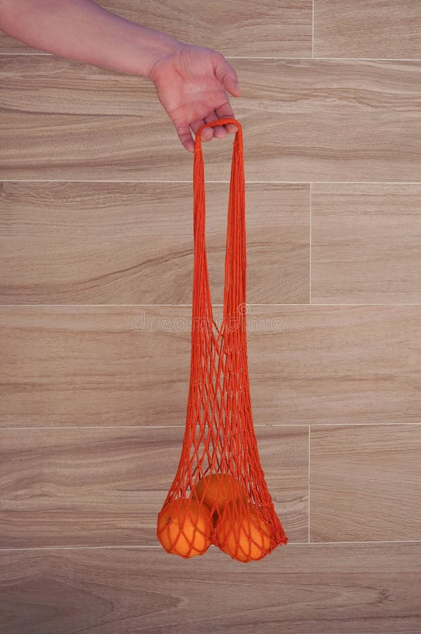 Orange string bag stock image. Image of fashion, supermarket - 149300083