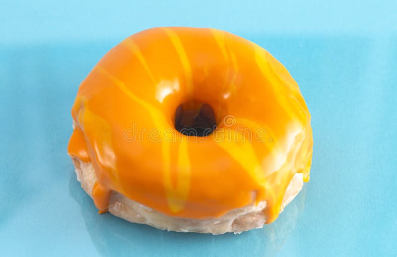 Orange Glazed Donut With Rainbow Sprinkles Stock Image - Image of sweet ...