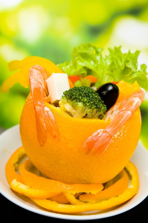 Orange stuffed by salad stock image. Image of cookery - 5176179