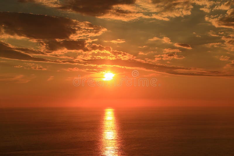 Orange sun with reflection stock image. Image of colors - 43021717
